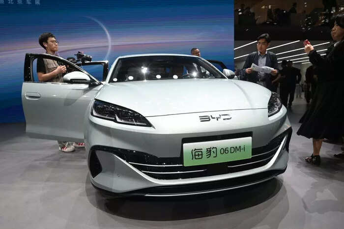 Chinese Tesla rival BYD says its new hybrid cars can go 1,250 miles ...