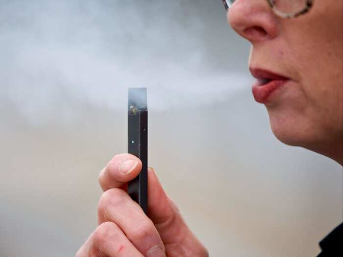 A former Juul executive filed a lawsuit alleging that the company ...